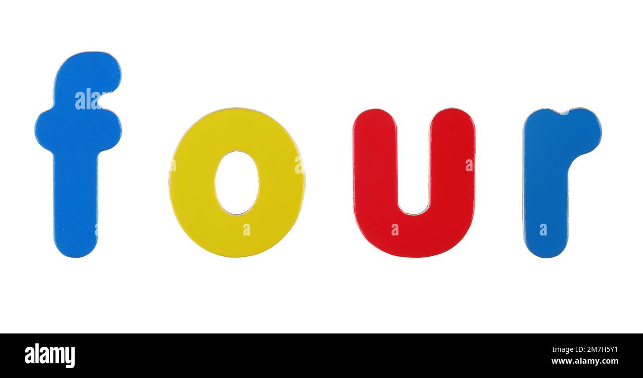 four coloured magnetic letters on white with clipping path concept ...
