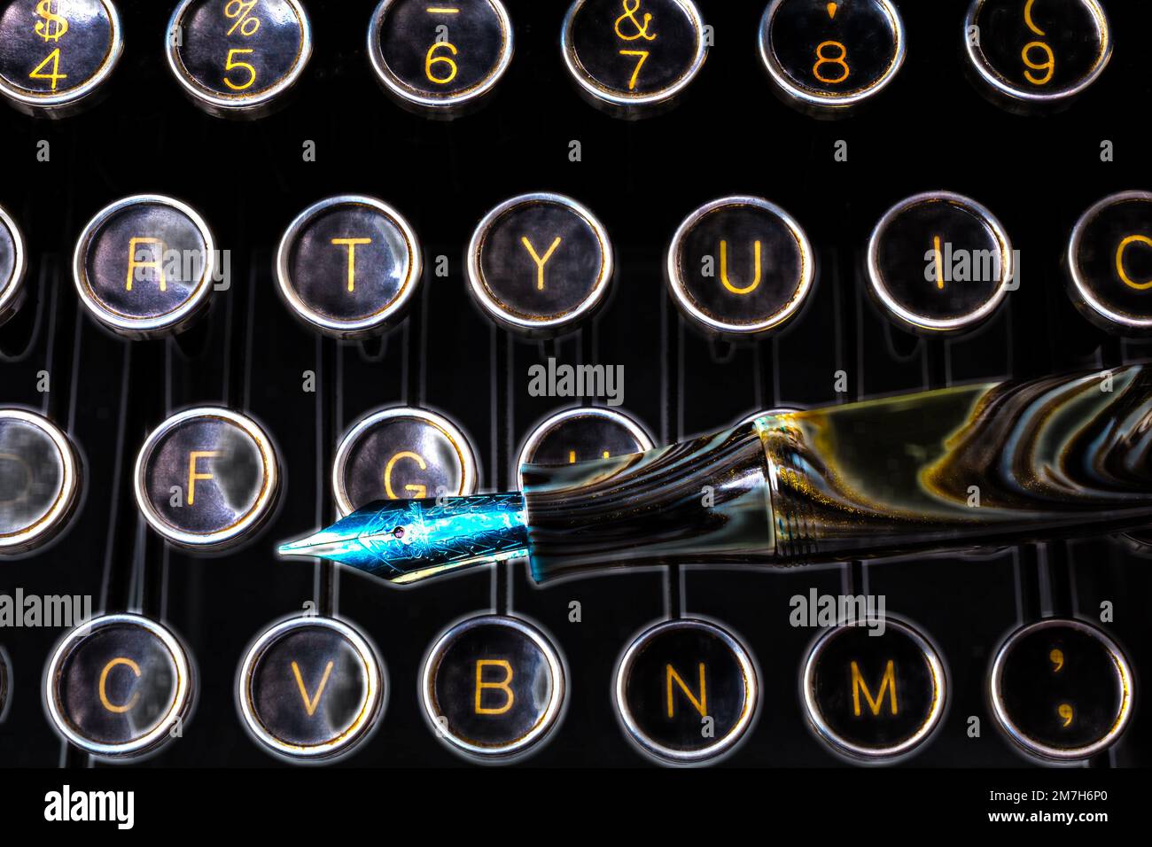 Fountain Pen On Typewriter Keys Stock Photo - Alamy