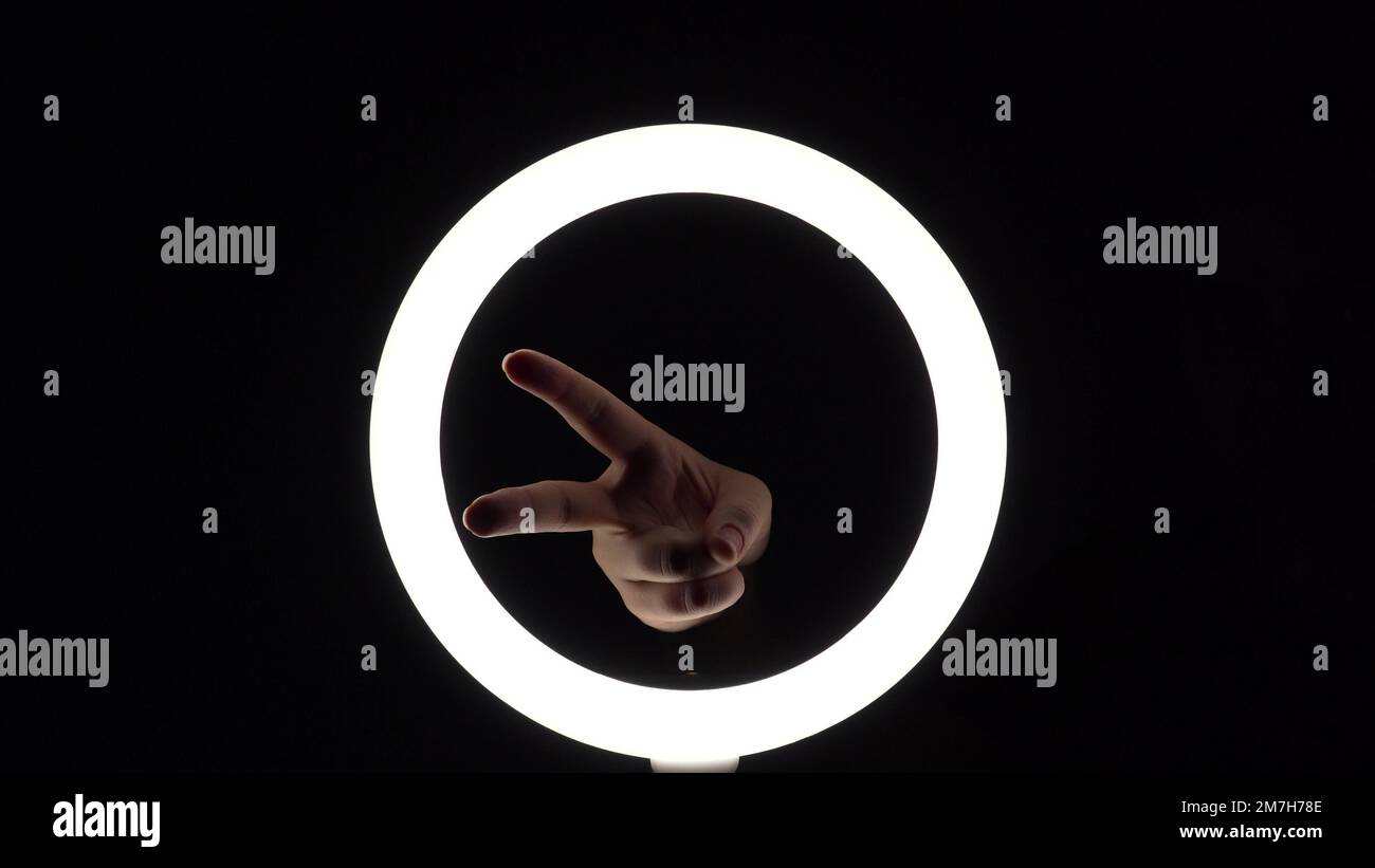 gesture package. female hands close-up make figures from fingers ...