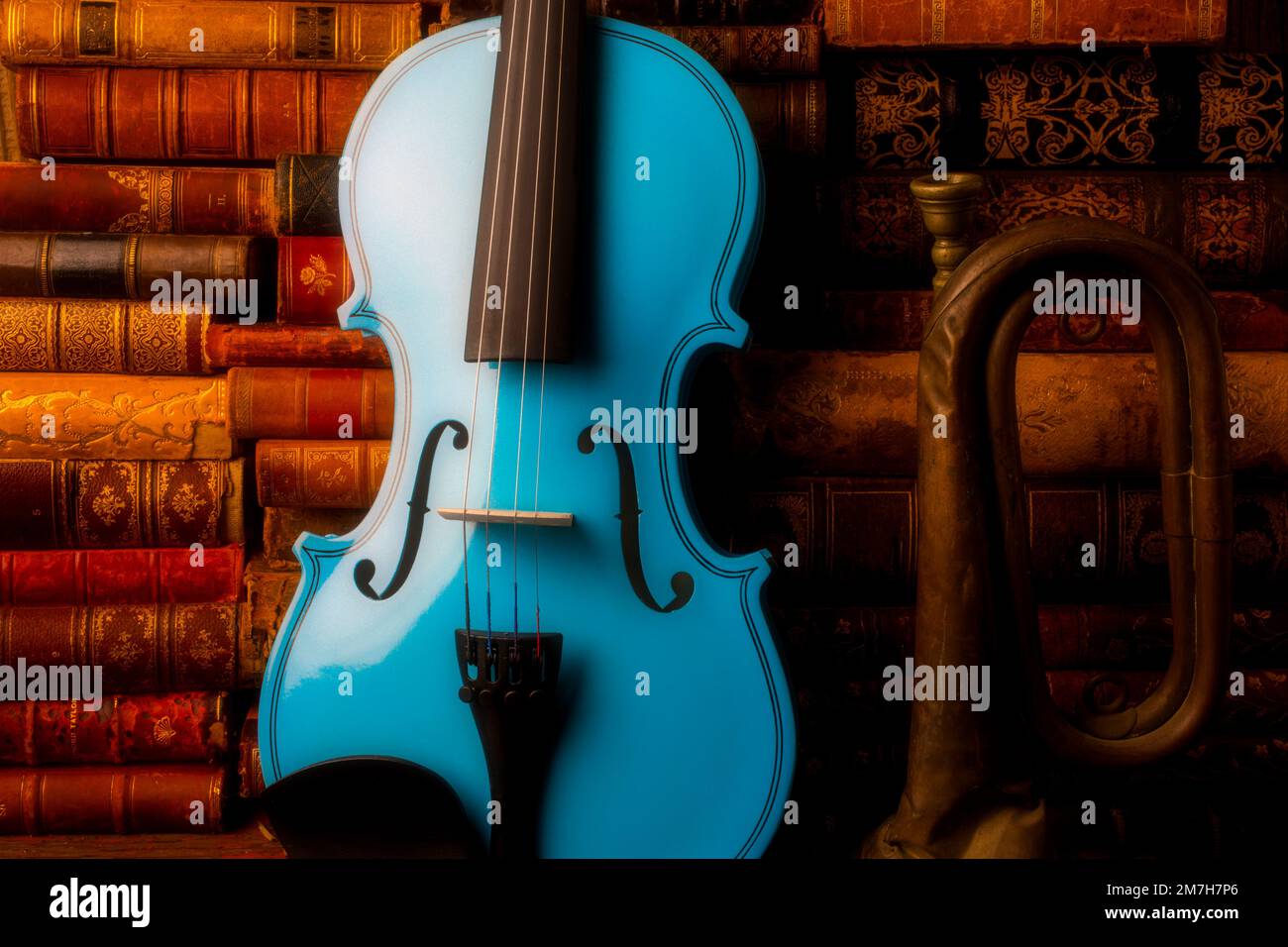 Blue Violin And Old Books Stock Photo - Alamy