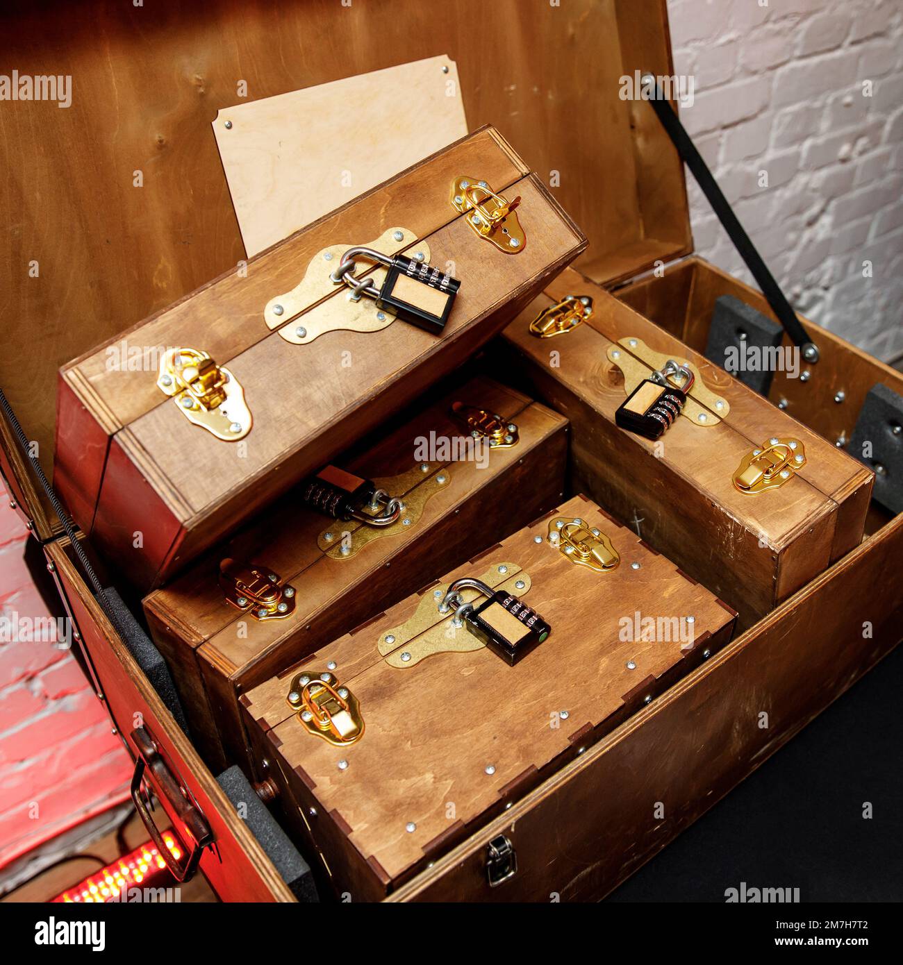 Old wooden boxes closed with a combination lock Stock Photo - Alamy