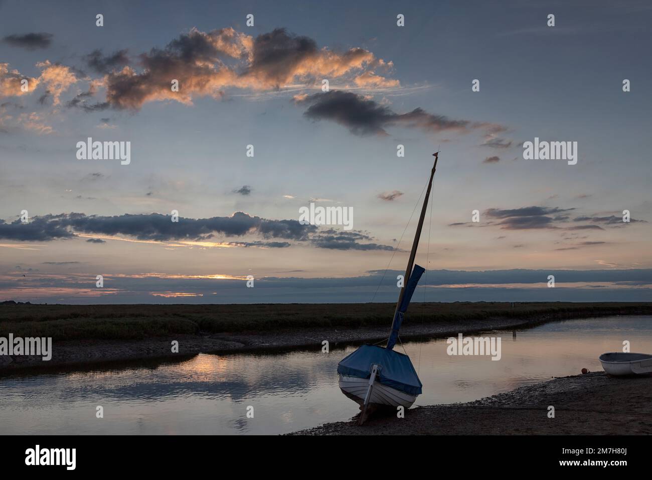 Sunset and dusk at Blakeney amongst the boats, Norfolk Coast, Norfolk ...