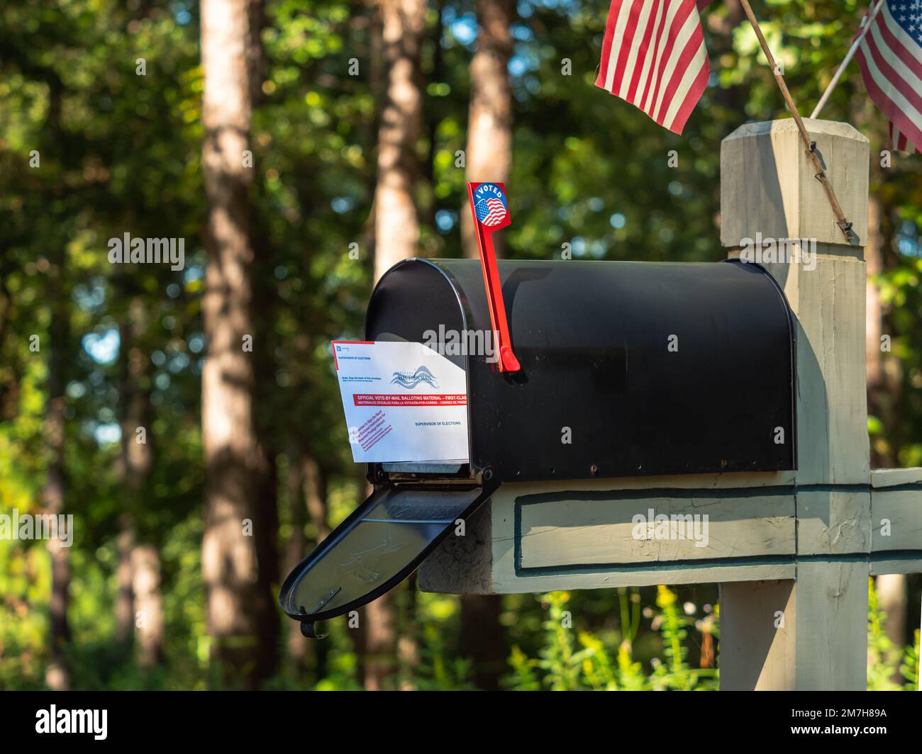 "I Voted" absentee voter vote by mail sticker on residential U.S ...