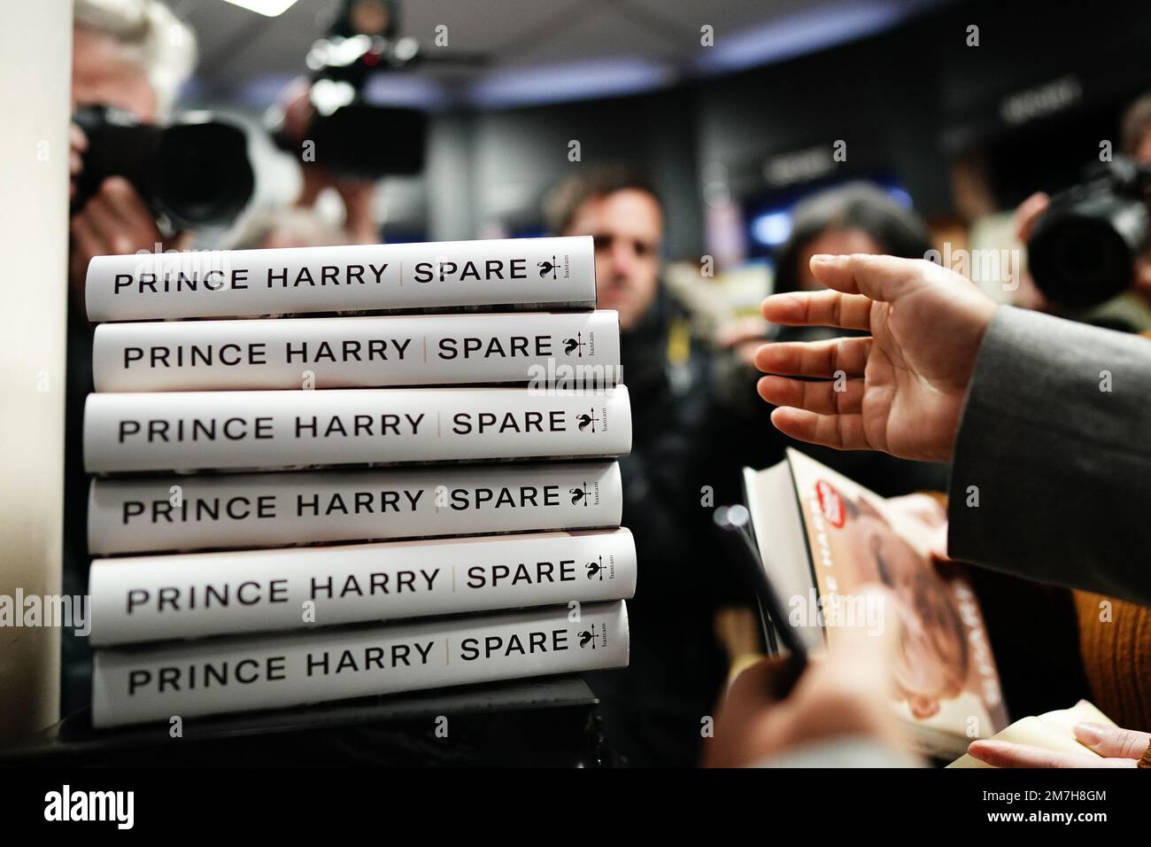 People reach for copies of of Spare, the newly released autobiography ...