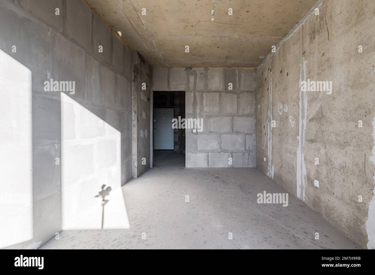 Empty concrete commercial space without finishing with partitions Stock ...