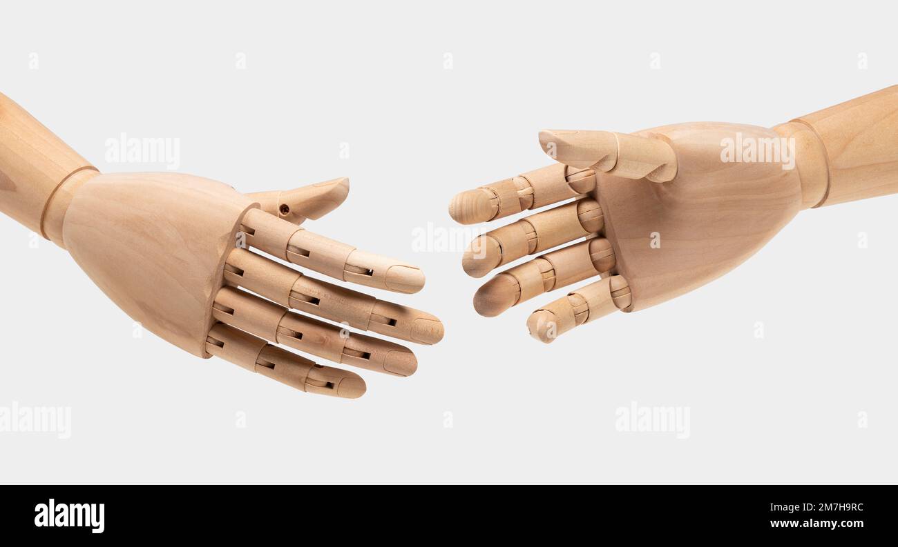 Two wooden mannequin hands on white background. Shaking hands. Business ...