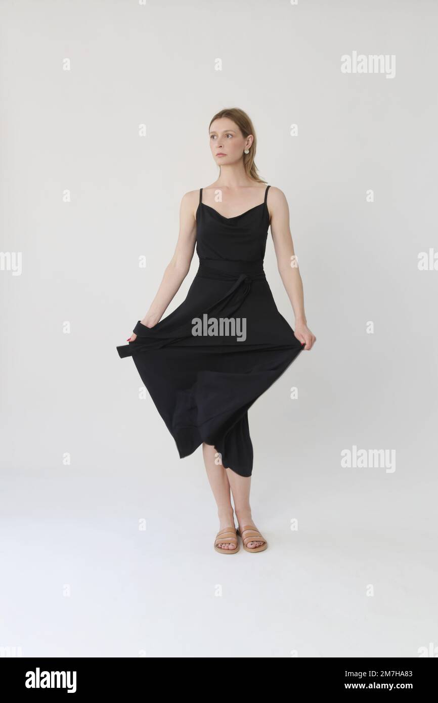 Serie of studio photos of young female model in comfortable yet stylish ...