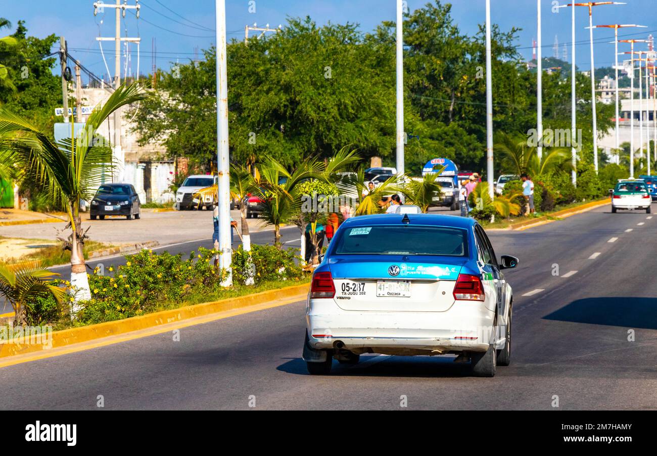 Colorful green turquoise blue orange taxi cab car in Puerto Escondido ...