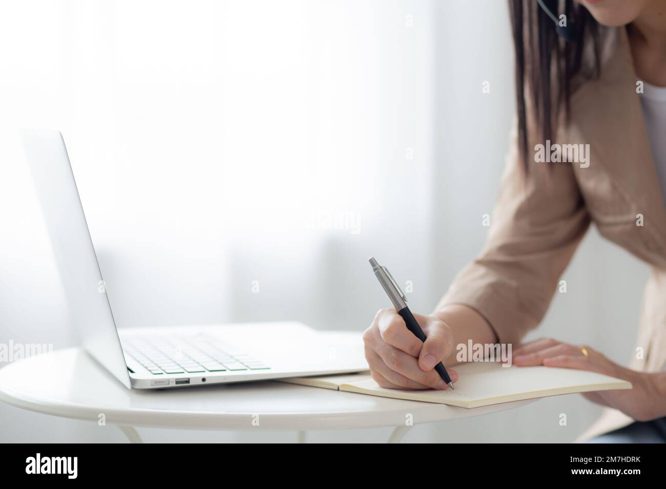 Closeup hands young asian woman writing on notebook for planning ...