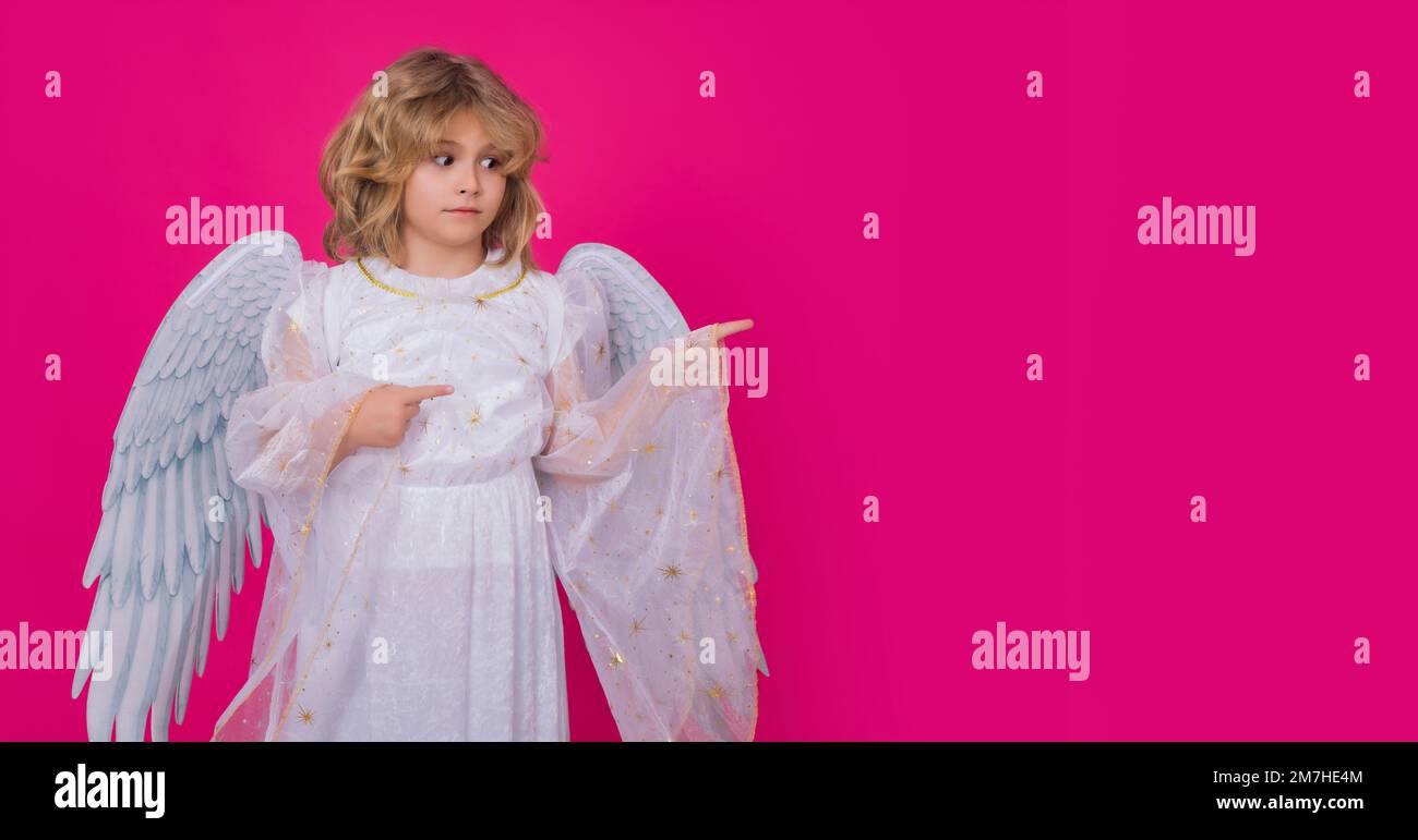 Child angel pointing finger, point gesture. Valentine's day. Banner for ...