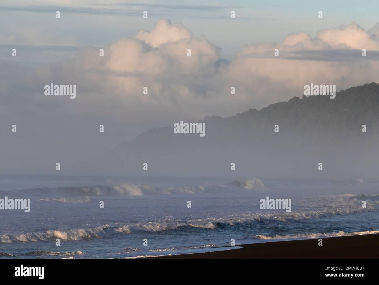 Misty Morning on the Pacific ocean beach, Carate, Costa Rica Stock ...