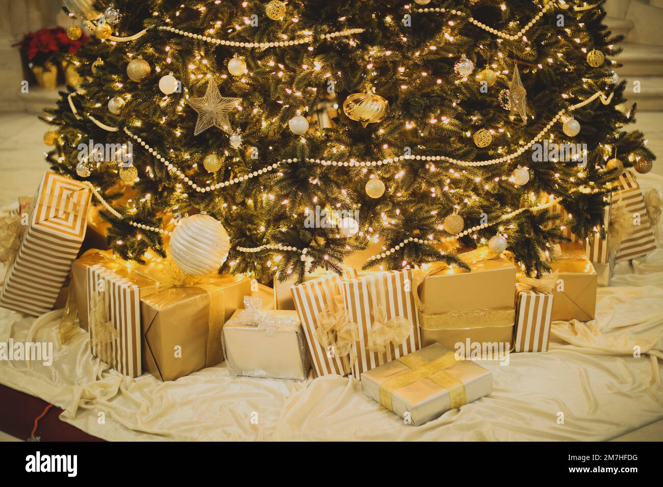 Christmas tree decoration presents Christmas lights warm colors Stock ...