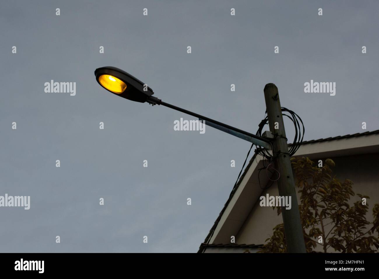 the residential lamp post illuminating the street Stock Photo - Alamy