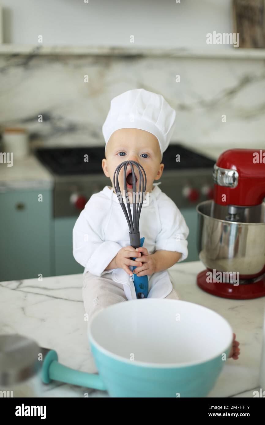 Baby chef cooking Stock Photo - Alamy