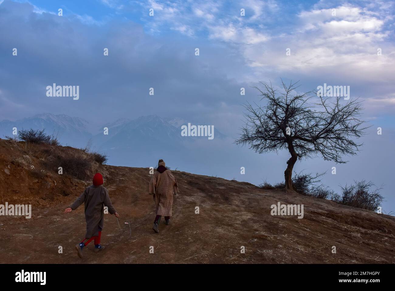 Srinagar, India. 09th Jan, 2023. Kashmiri children seen wearing Pheran ...