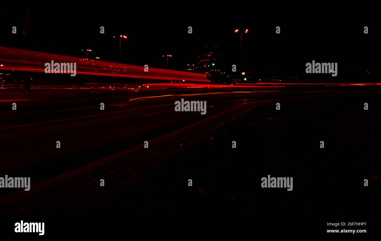 Lights of cars at night. Street line lights. Night highway city. Long ...