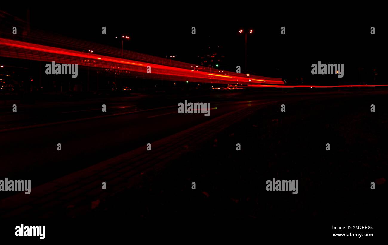 Lights of cars at night. Street line lights. Night highway city. Long ...