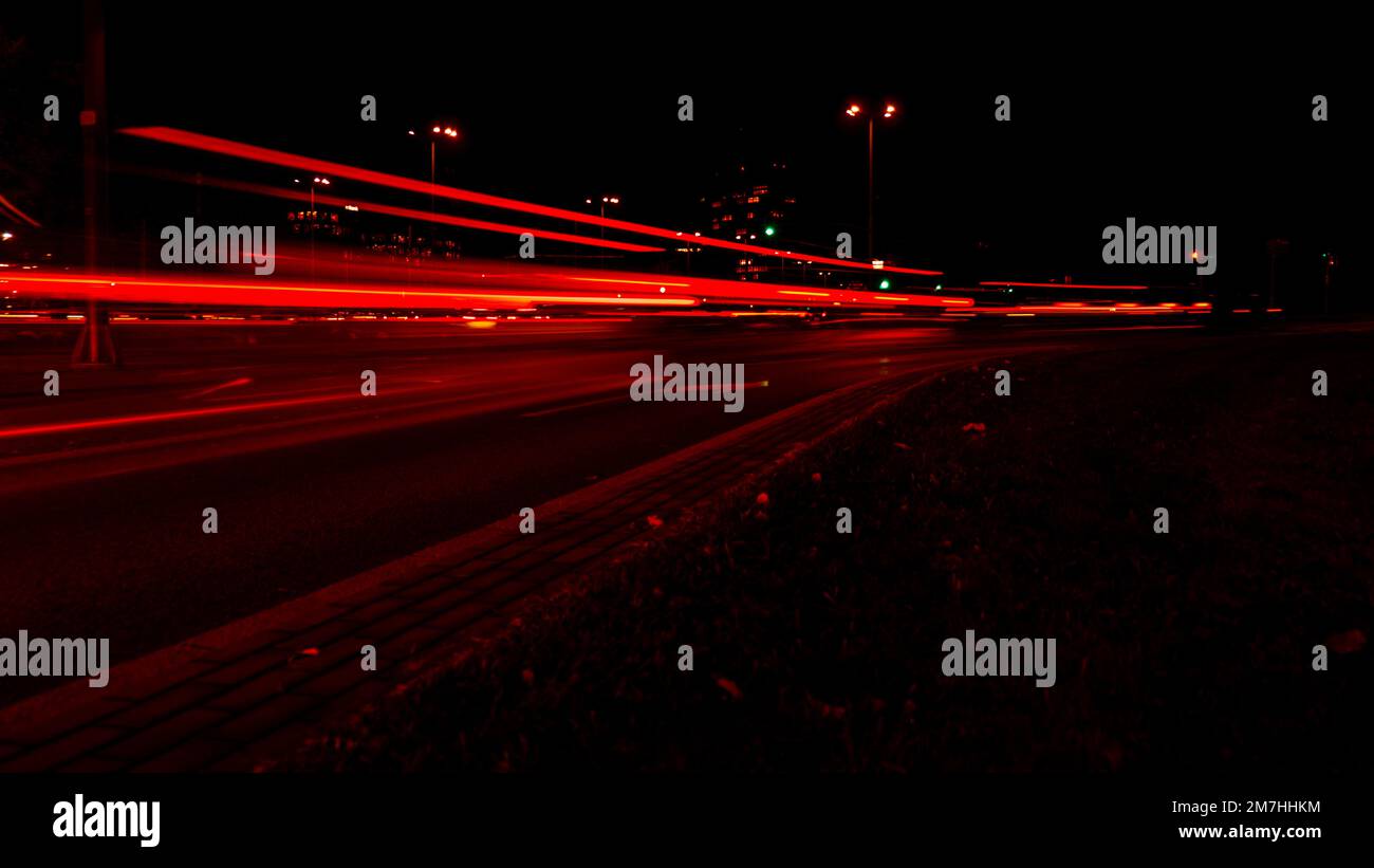 Lights of cars at night. Street line lights. Night highway city. Long ...