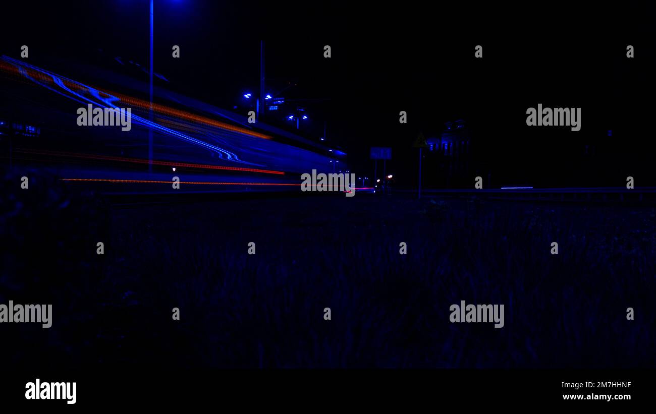 Lights of cars at night. Street line lights. Night highway city. Long ...