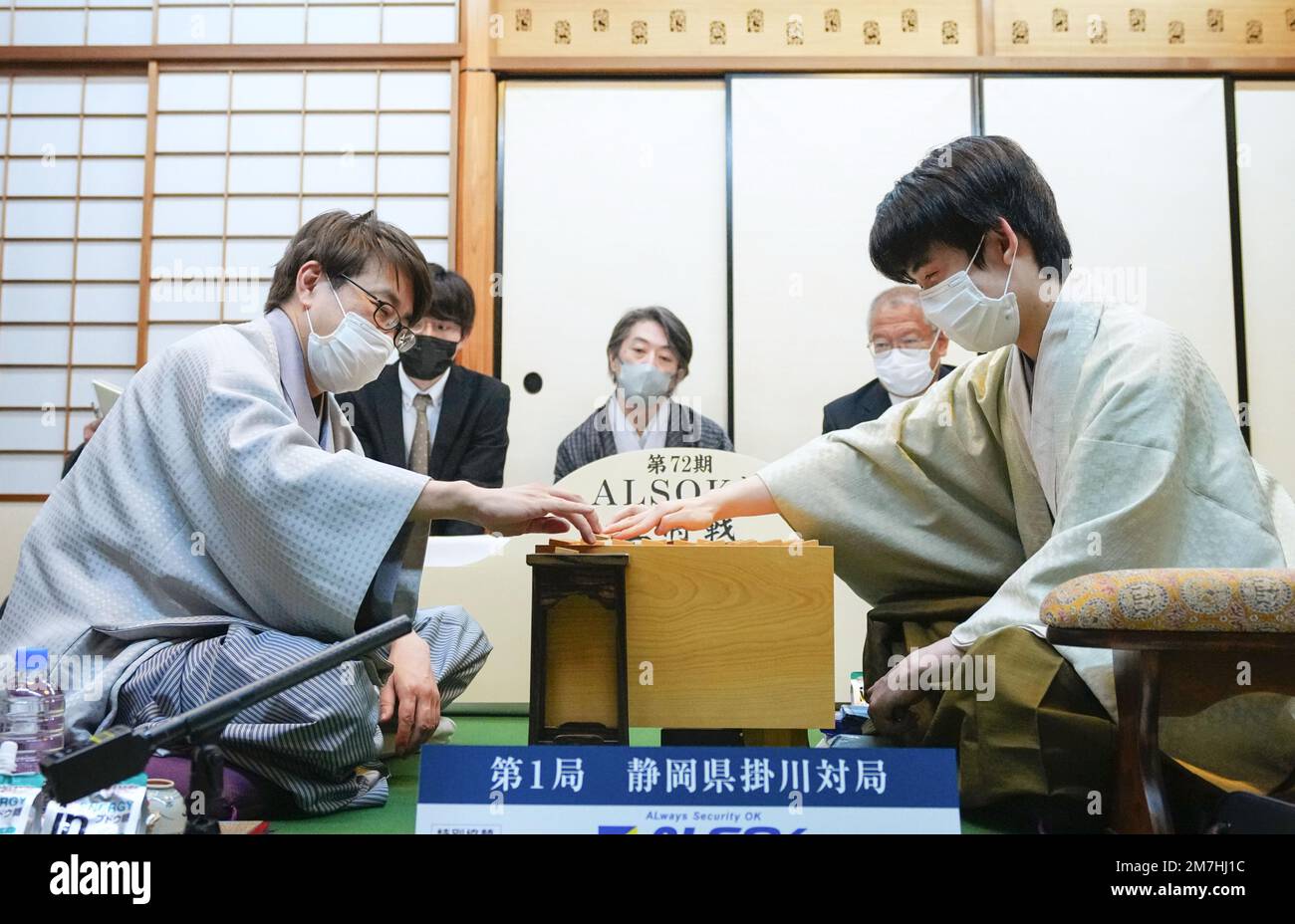 Defending champion Sota Fujii (R) and challenger Yoshiharu Habu reflect ...