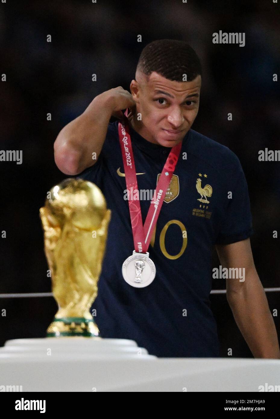 Beijing, Qatar. 18th Dec, 2022. Kylian Mbappe looks at the FIFA World ...