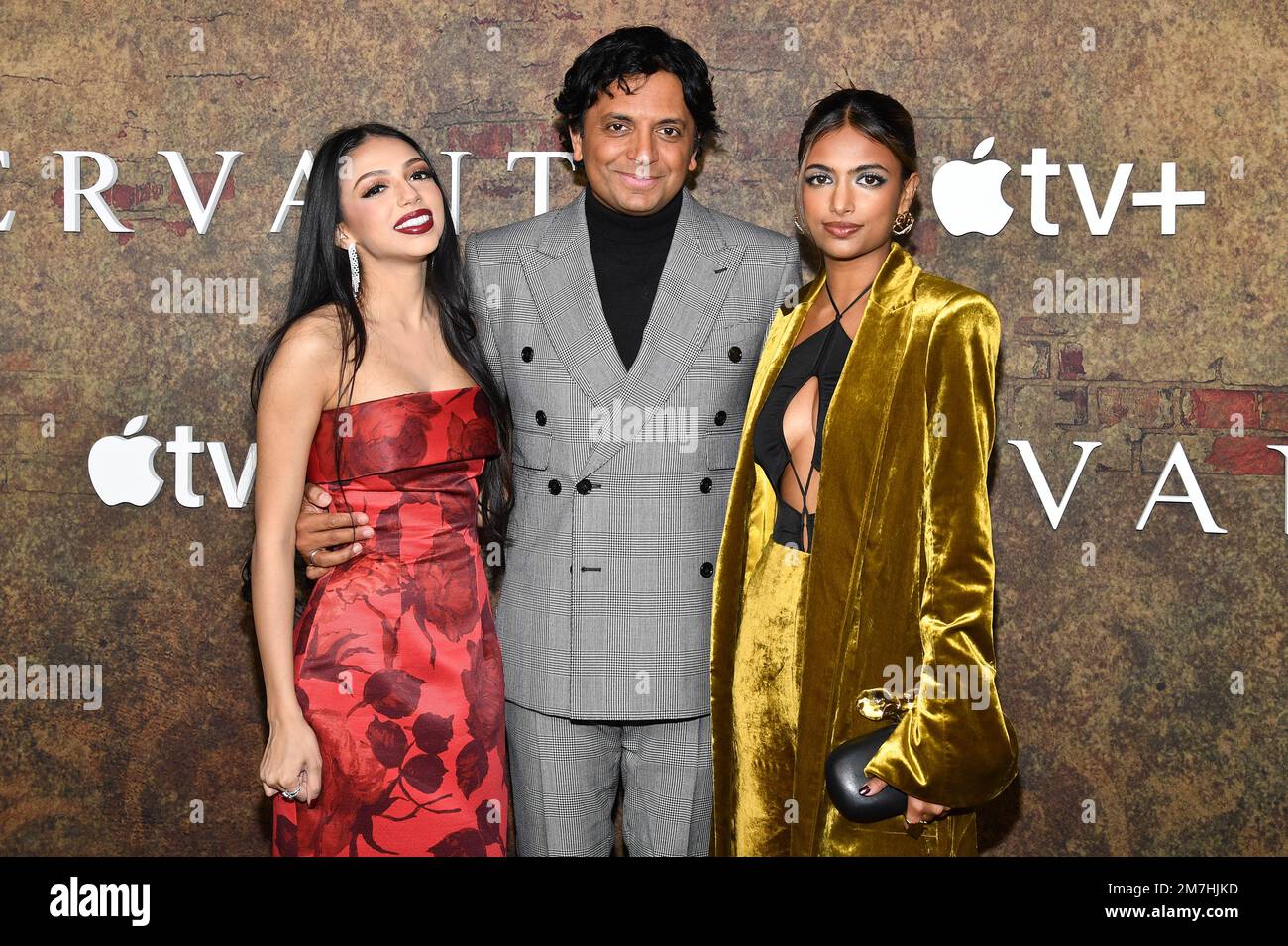 M. Night Shyamalan, (c), and daughters Saleka Shyamalan, (l), and Ishana Shyamalan attend the ...