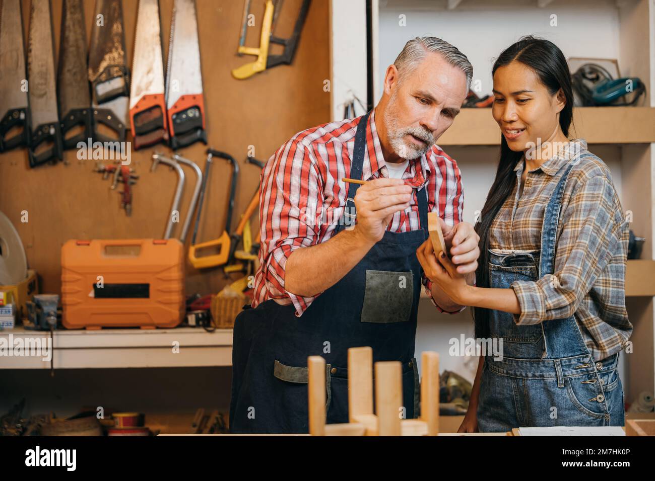 Teamwork carpenter apprentice hi-res stock photography and images - Alamy