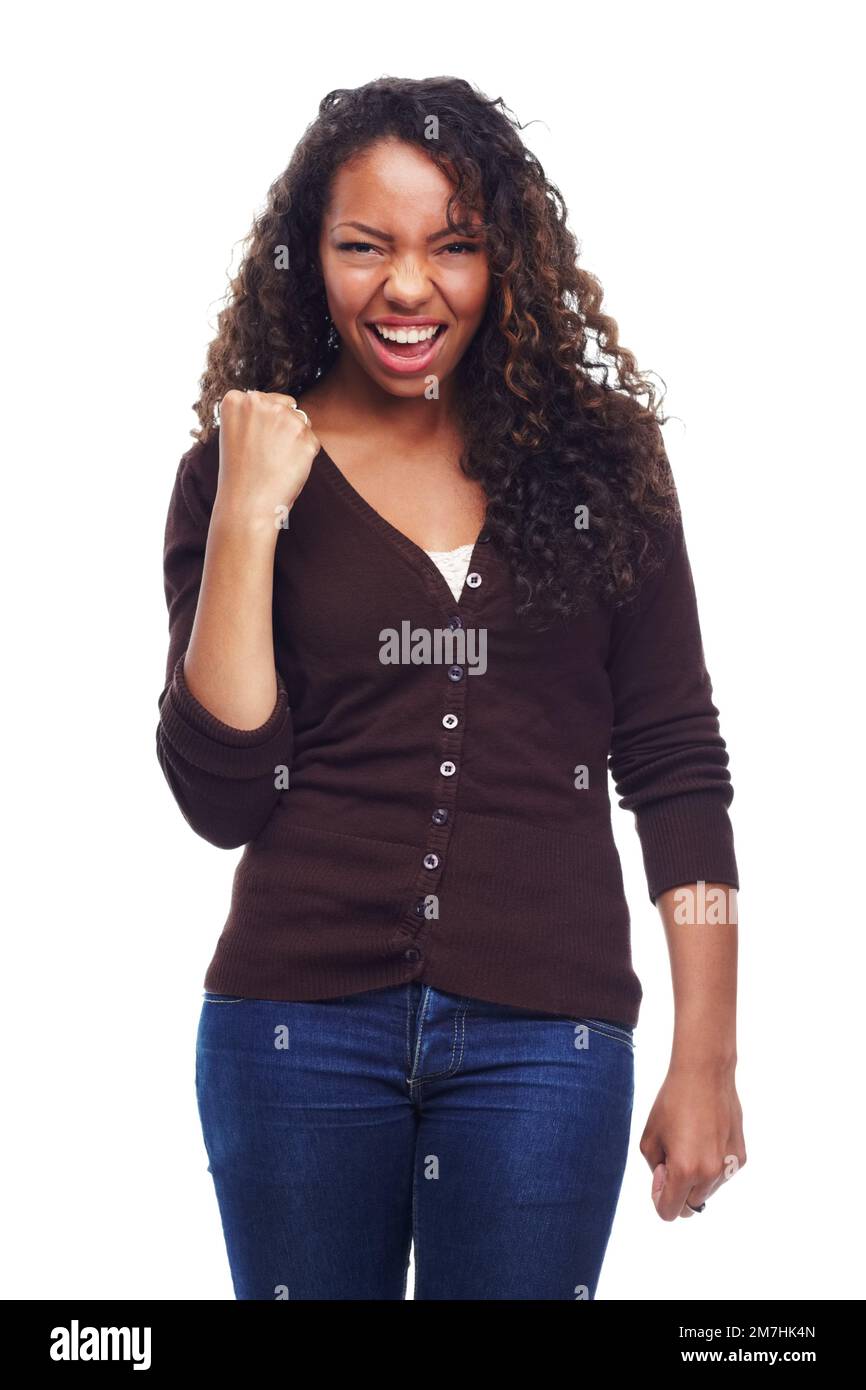 She did it. Studio portrait of an attractive teenage girl celebrating a ...