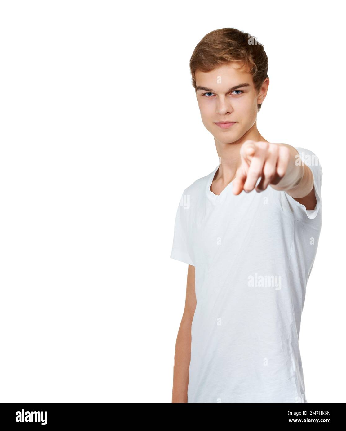 Casually handsome. A cropped portrait of a handsome young man pointing ...