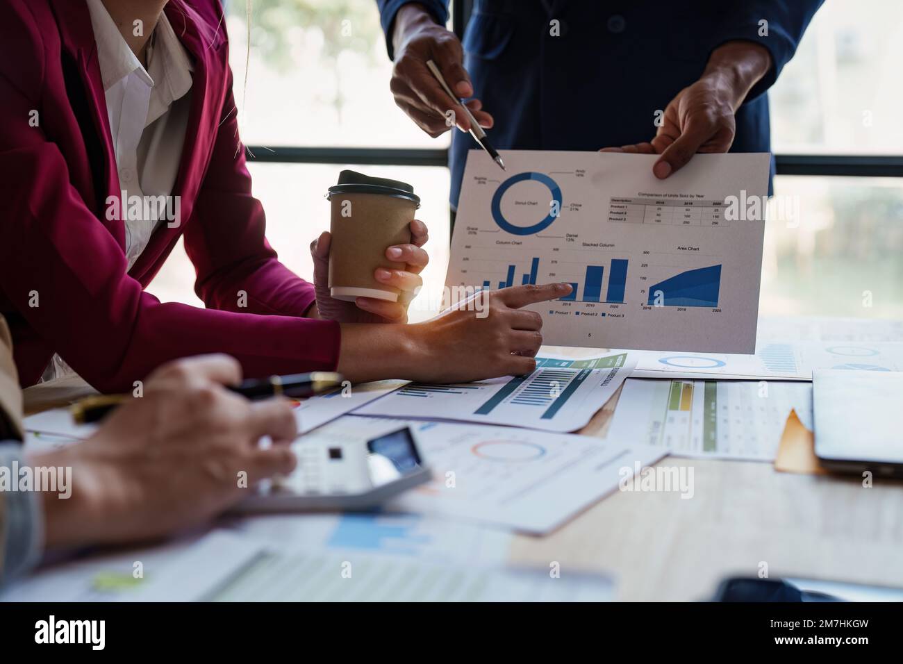 Close up Business team of financial analyze about company's graph ...