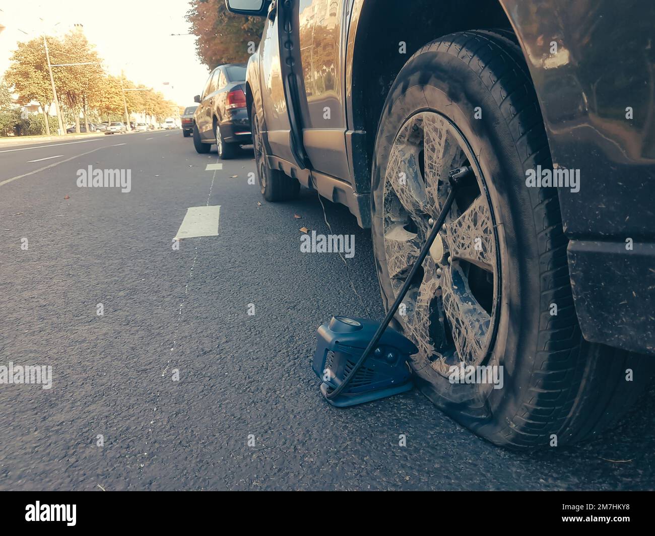 close up. damaged wheel of a modern car Stock Photo - Alamy