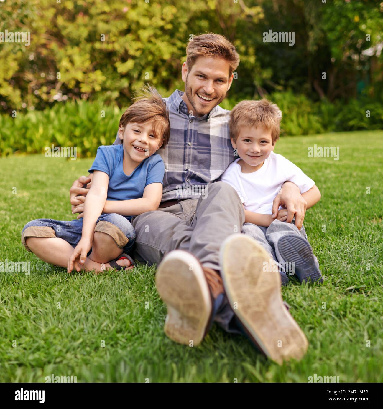 My boys are such a blessing. Portrait of a father and his two little ...