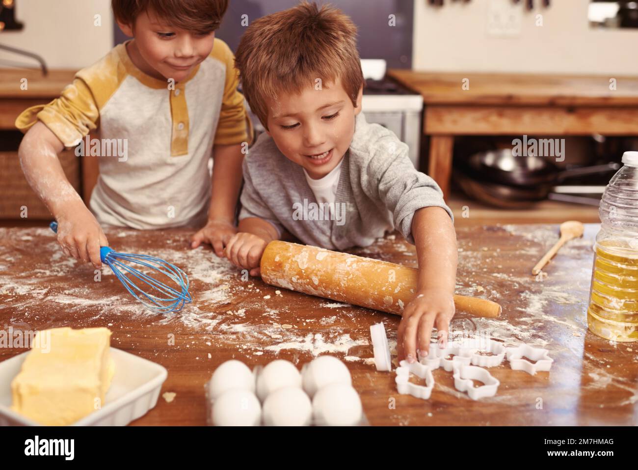 Two young brothers standing hi-res stock photography and images - Alamy