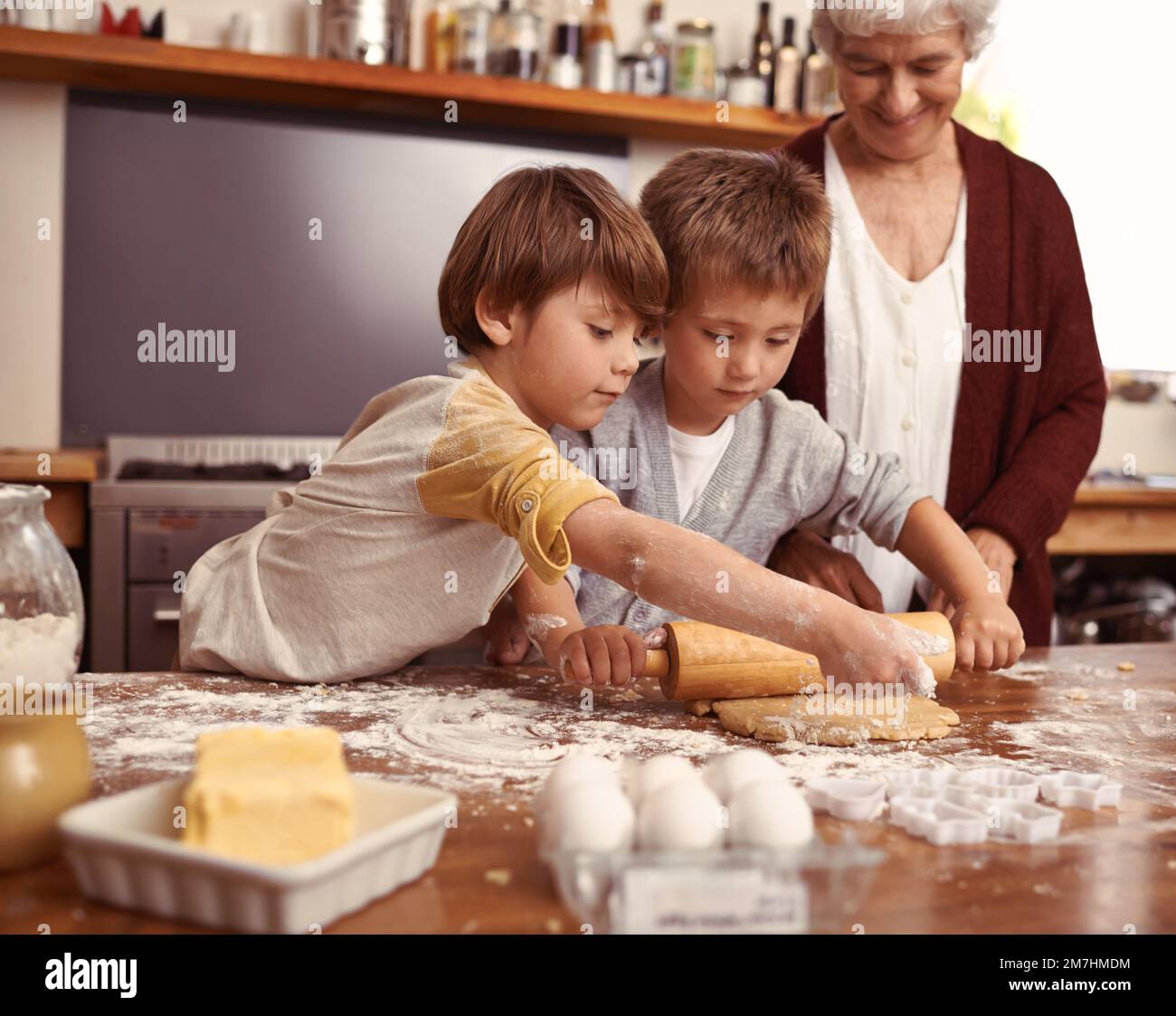 Look gran, were making the cookies ourselves. Two cute little boys ...