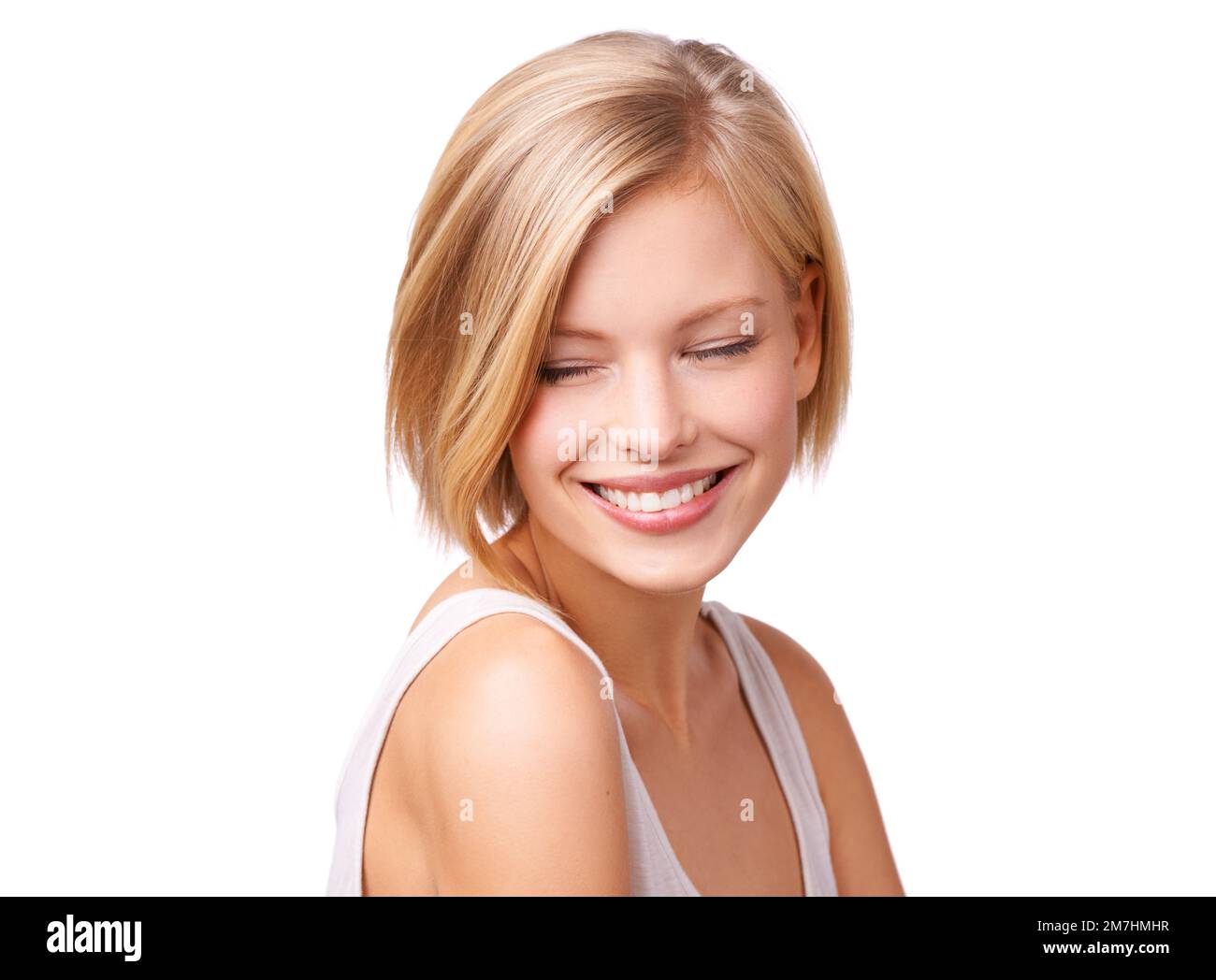 She always gets shy around the boys. Studio shot of a gorgeous young ...