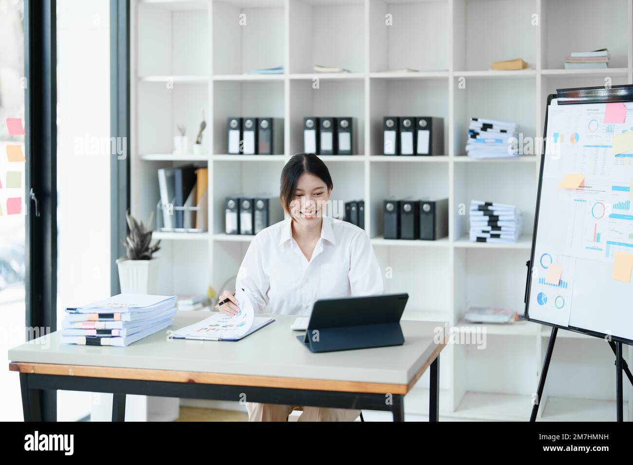 Portrait of a woman business owner showing a happy smiling face as he ...
