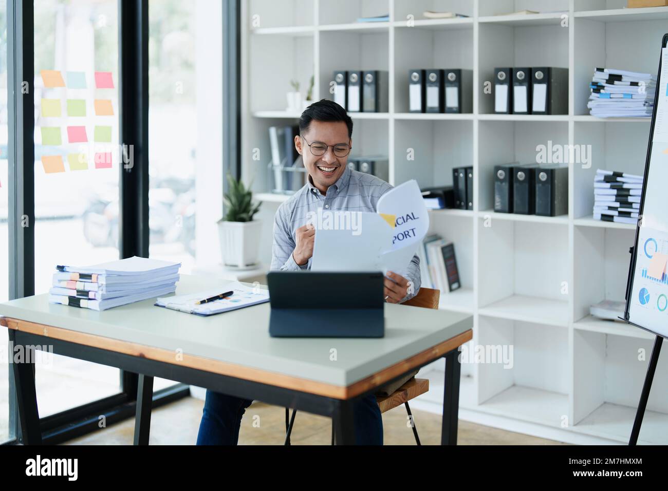 Portrait of a man business owner showing a happy smiling face as he has ...