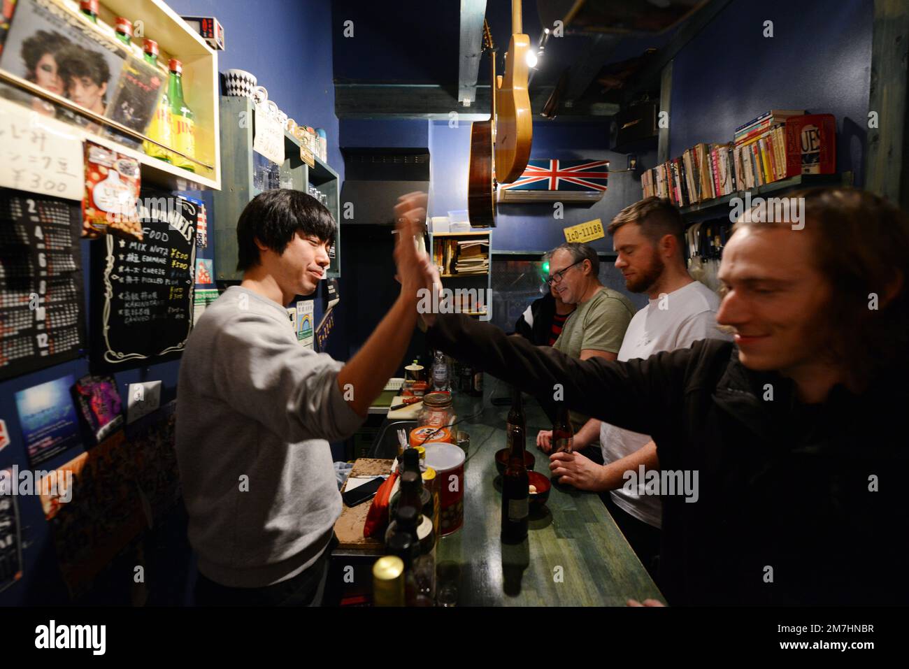Drinking in a small atmospheric pub in the Golden Gai pub area in ...