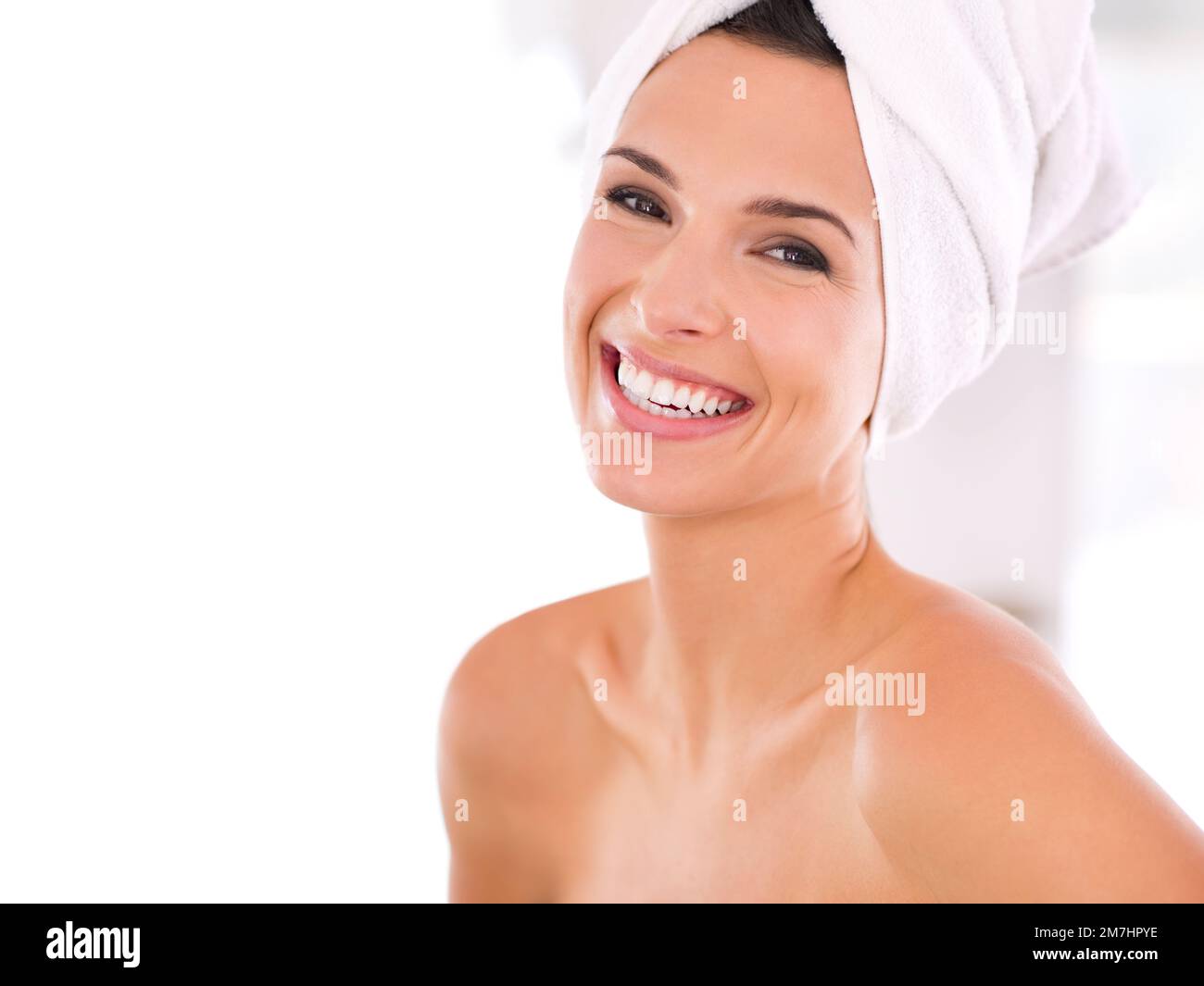 She loves her skin. Portrait of a beautiful woman looking happy during ...