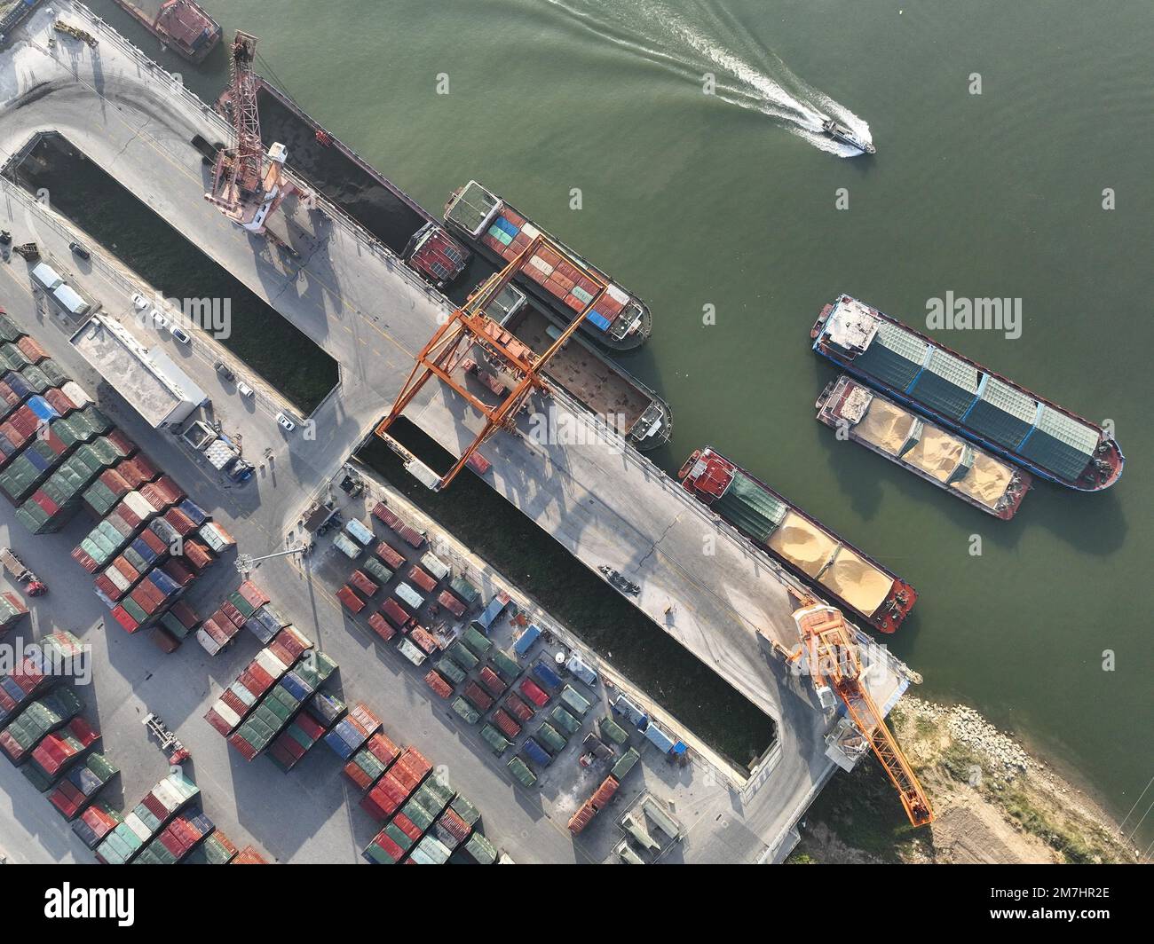 Aerial photo shows the busy scene at the dock of the Dalikou operation ...
