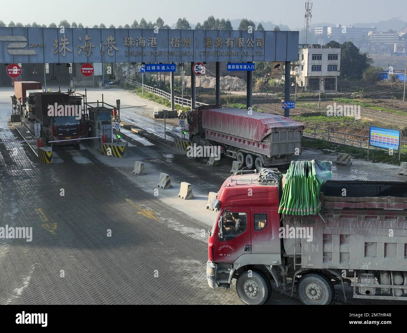 Aerial photo shows the busy scene at the dock of the Dalikou operation ...