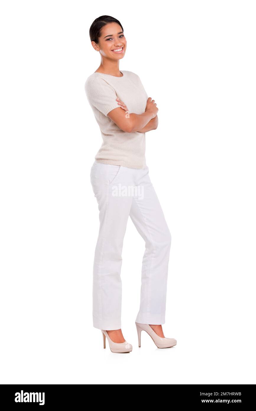 Beaming with confidence. A beautiful young woman standing with her arms ...