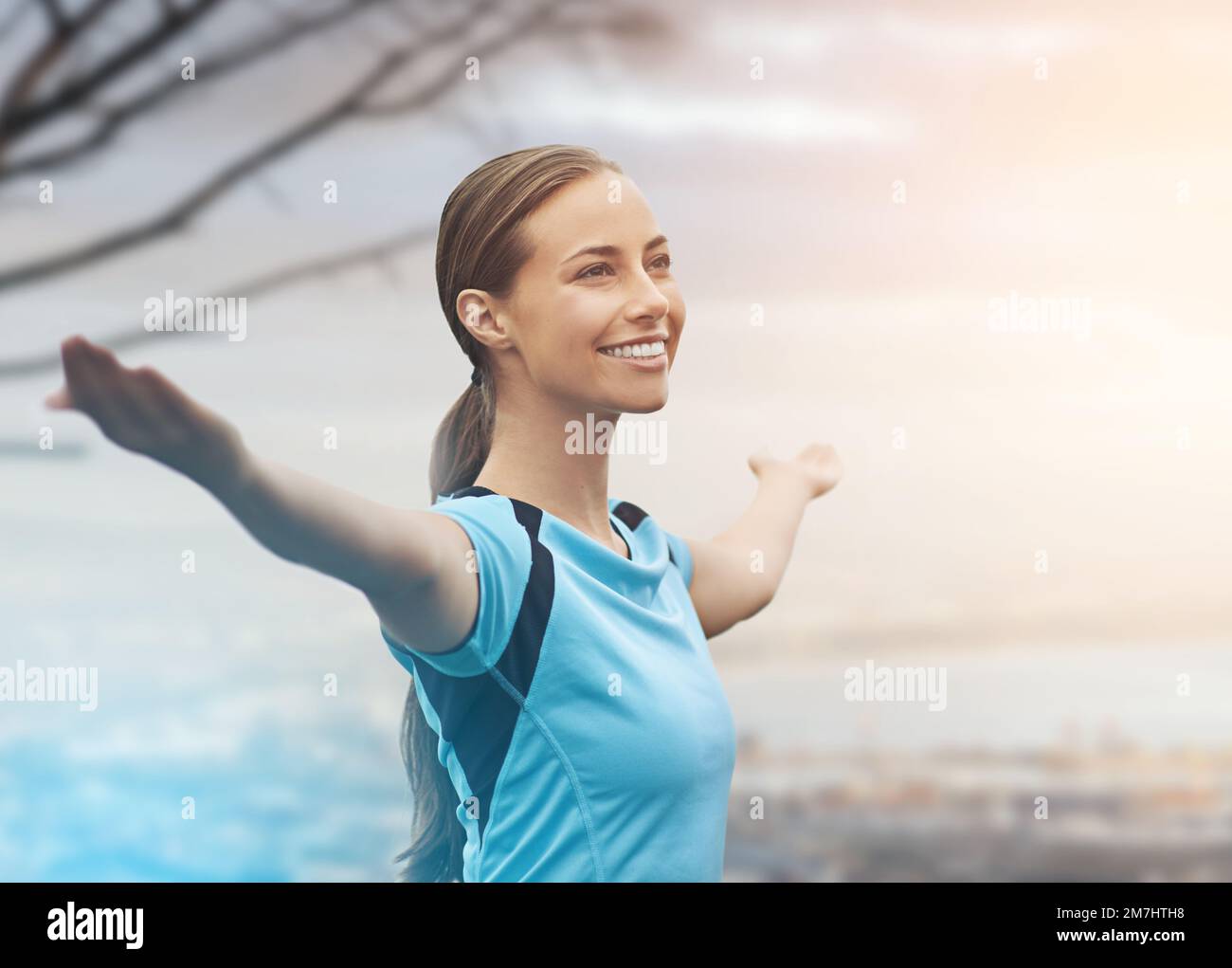 Take time to enjoy the simple things. a young woman training outdoors ...