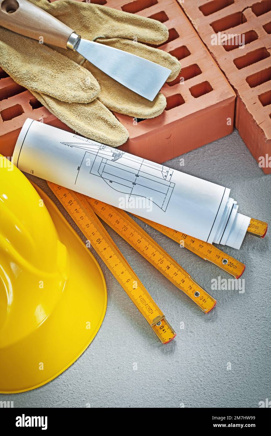 Assortment of bricklaying tools on concrete surface top view ...