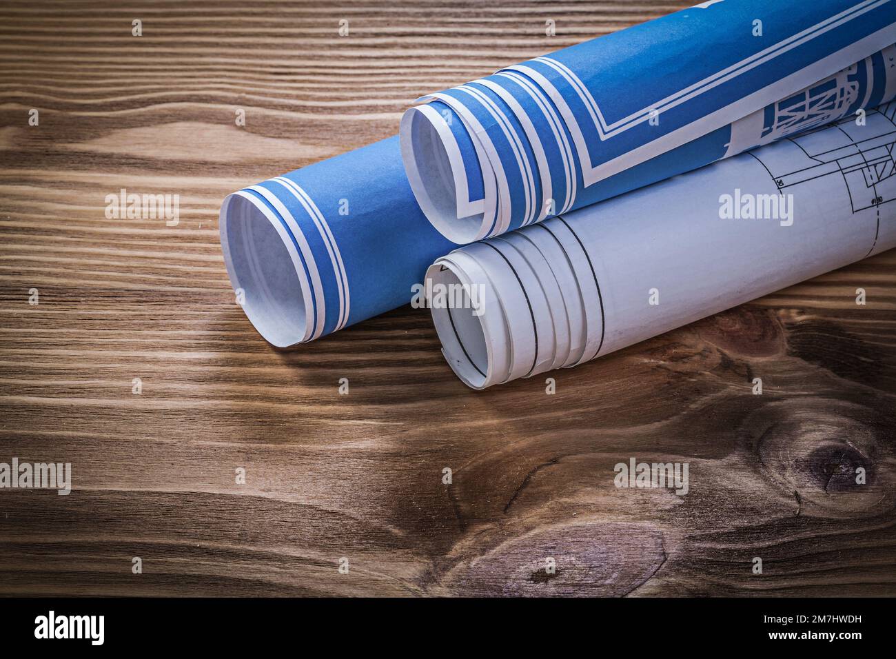 Blue blueprints on vintage wooden board construction concept Stock ...