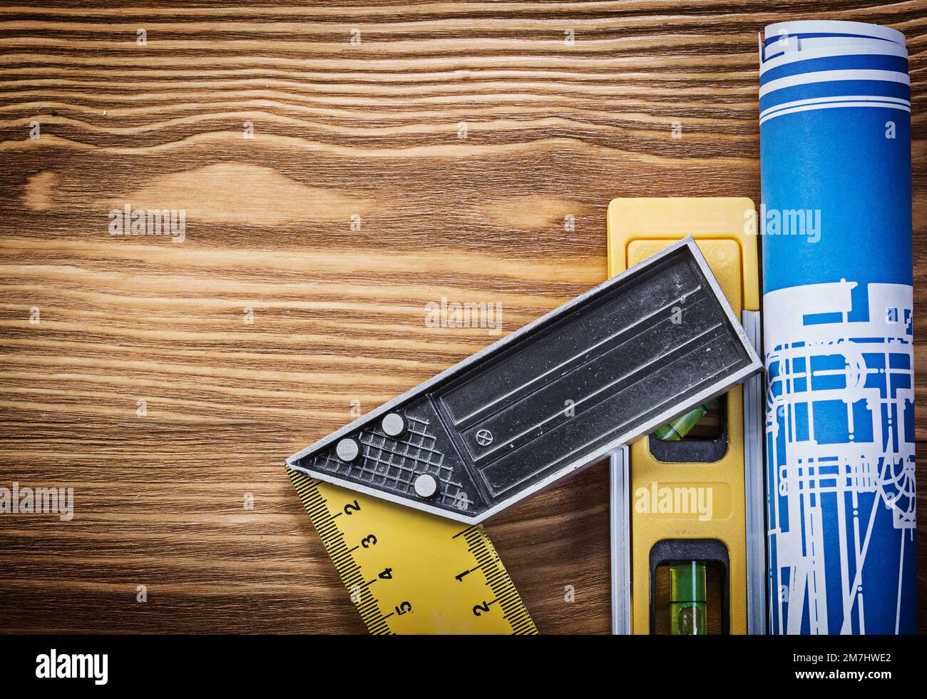 Blue construction drawing level try square on wooden board Stock Photo ...