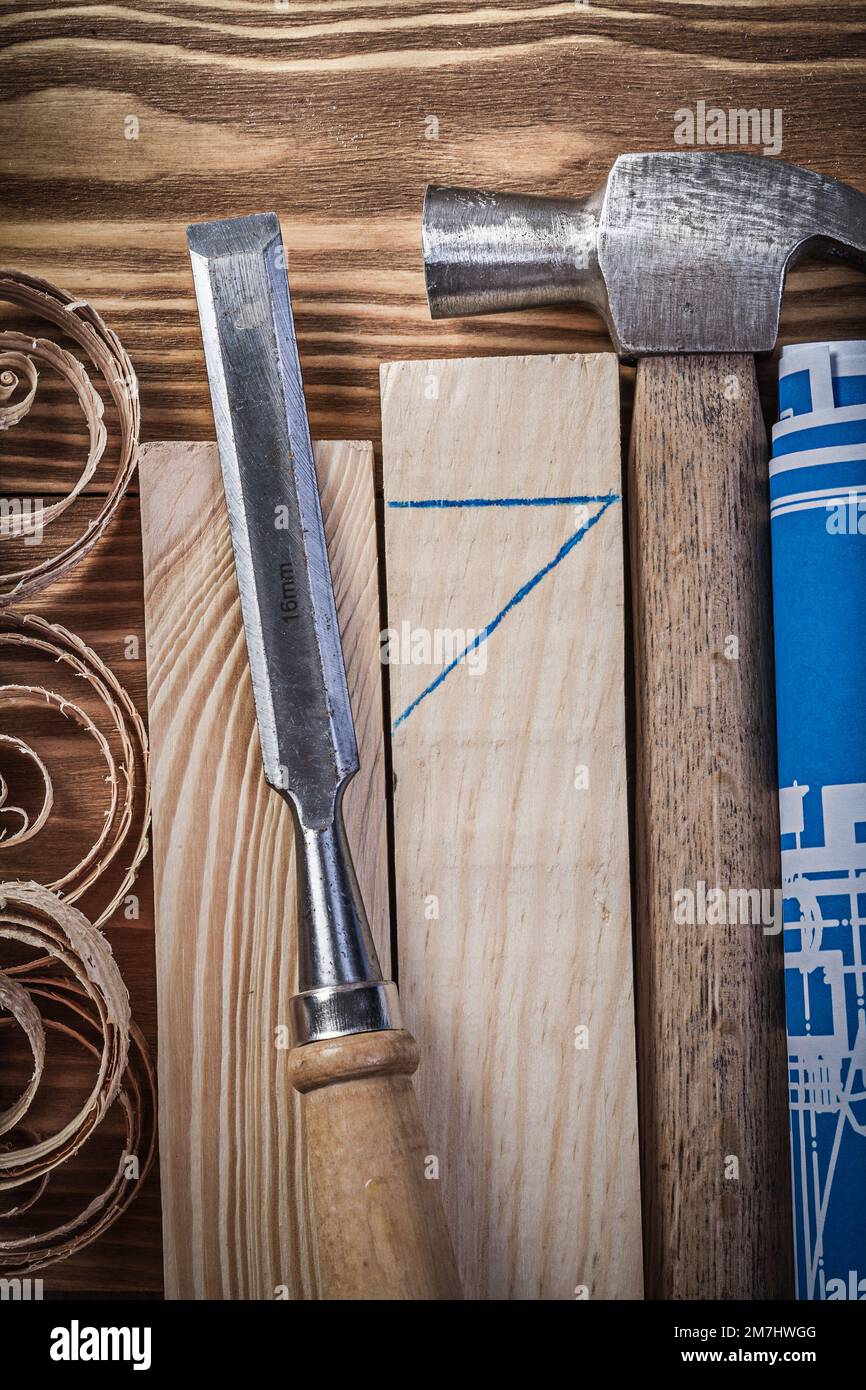 Blue engineering drawing claw hammer flat chisel wooden studs shavings ...