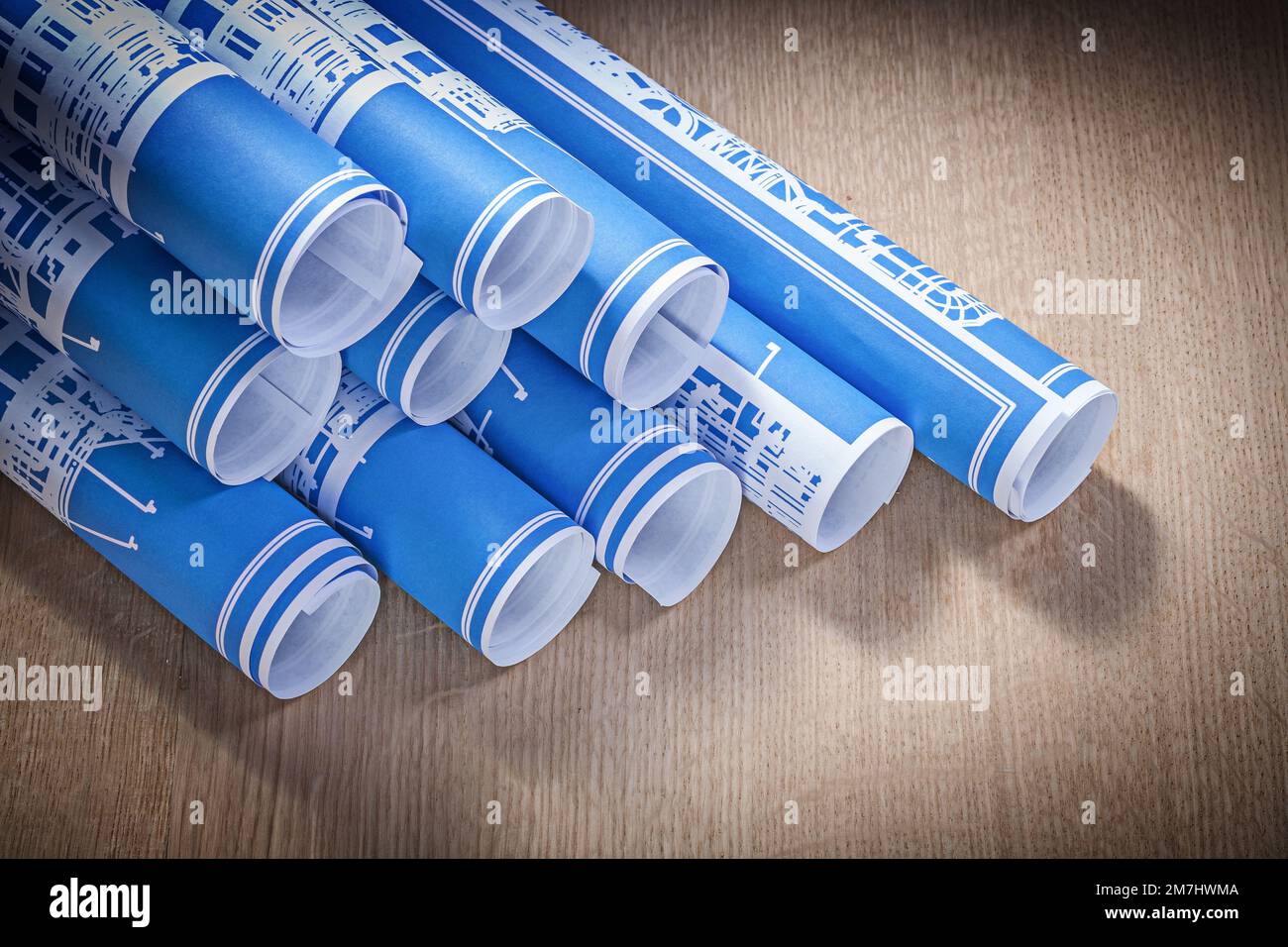 Blue engineering drawings on wooden board construction concept Stock ...