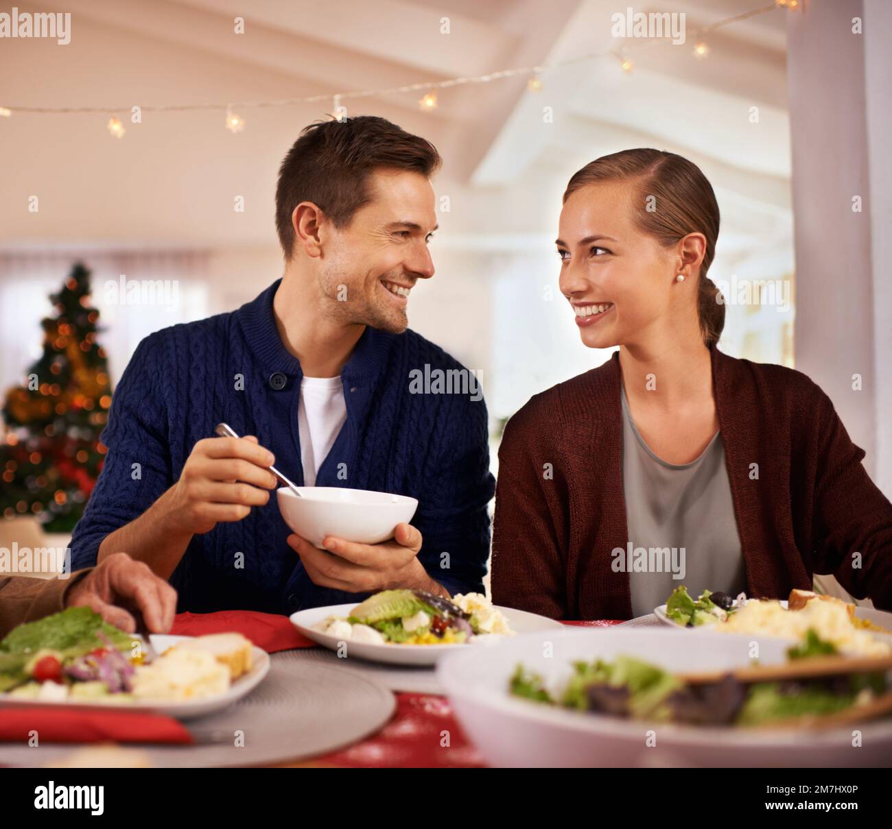 What a delicious Christmas dinner you made. a happy young couple eating ...