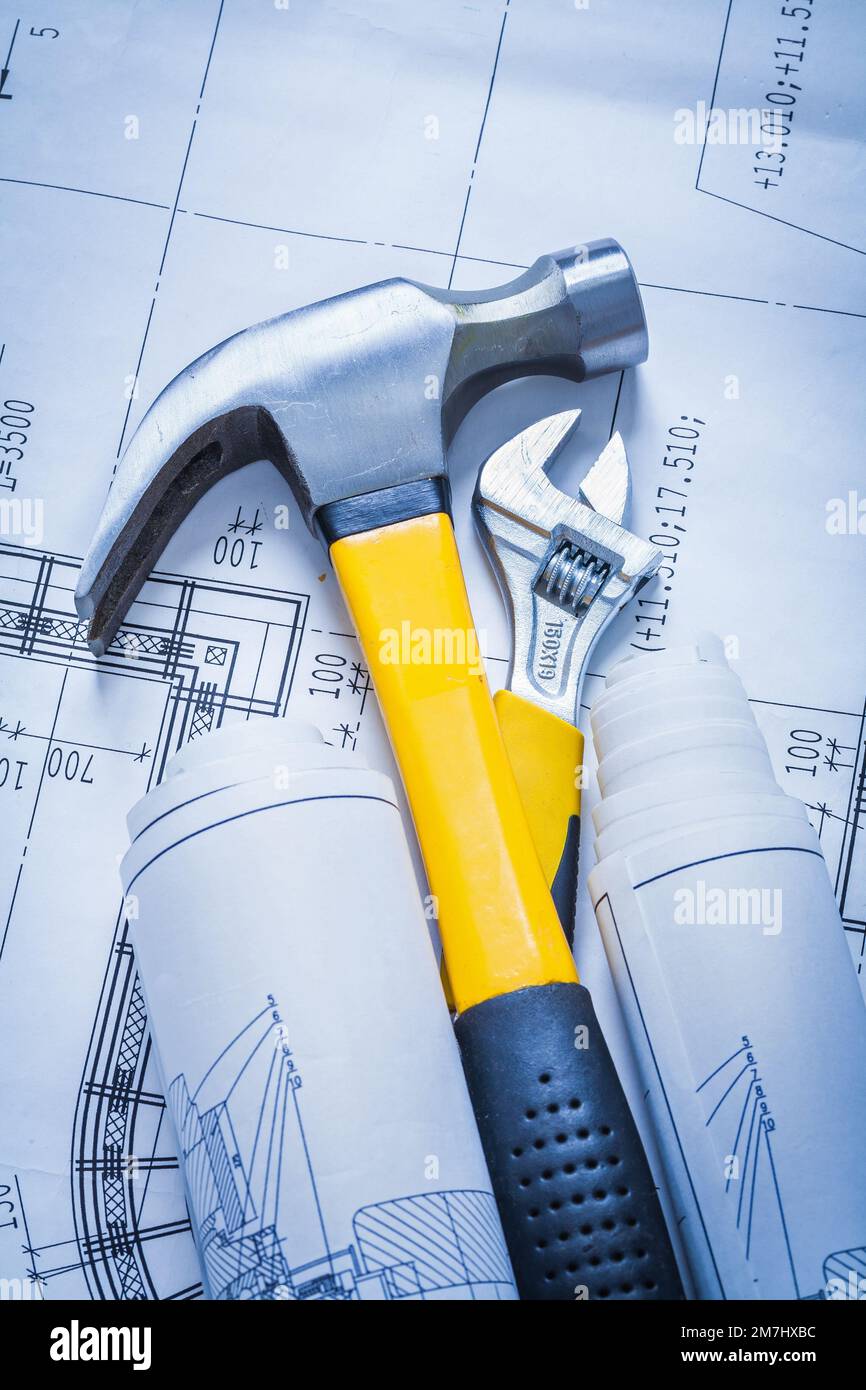 Claw hammer roll of construction plans adjustable spanner building and ...